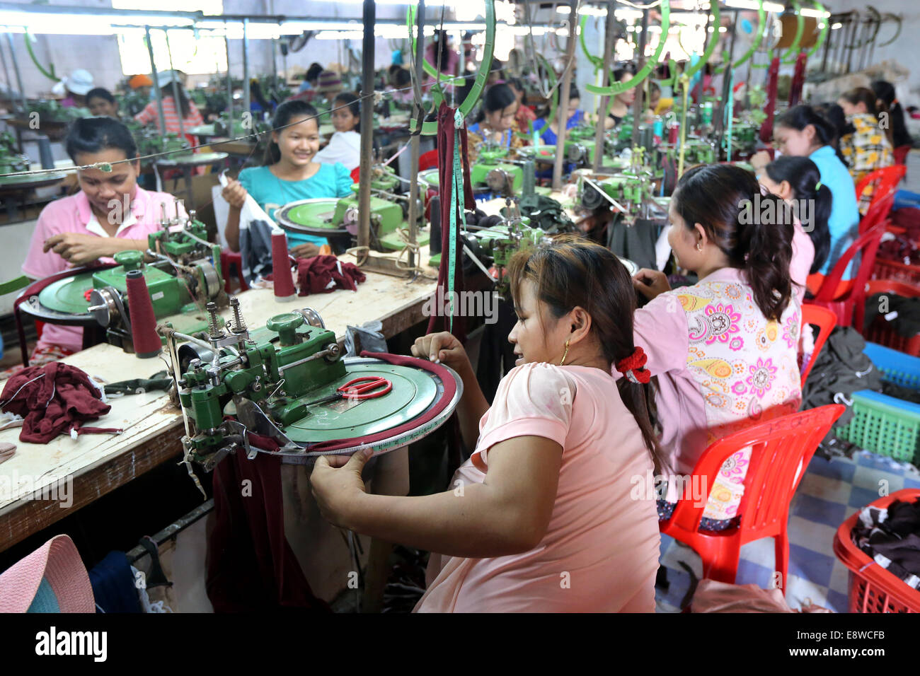 Female workers in a chinese operated textile factory in Thanaut Tee ...