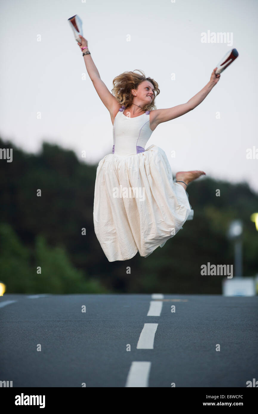 Woman Jumping In Dress