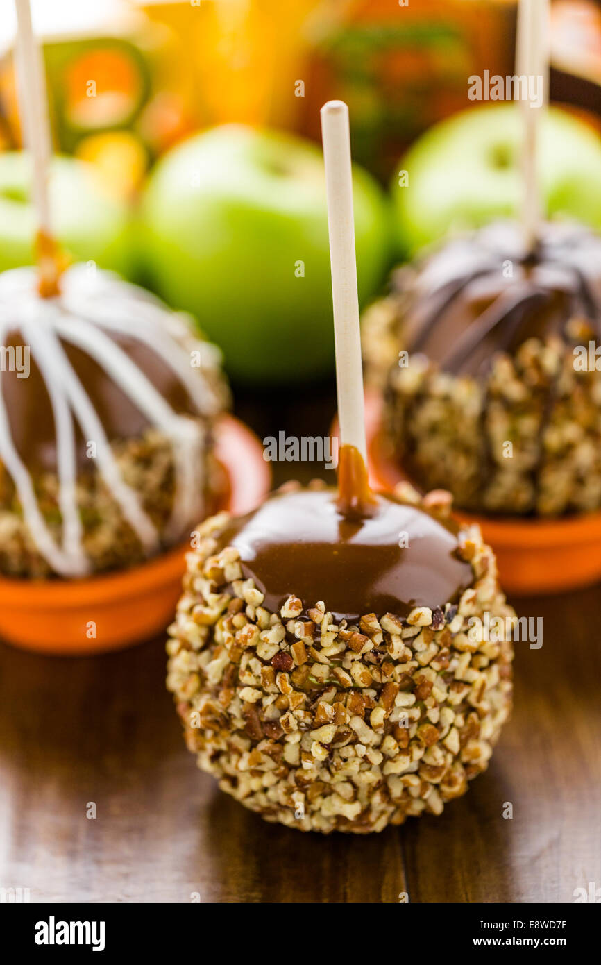 Hand dipped caramel apples decorated for Halloween Stock Photo - Alamy