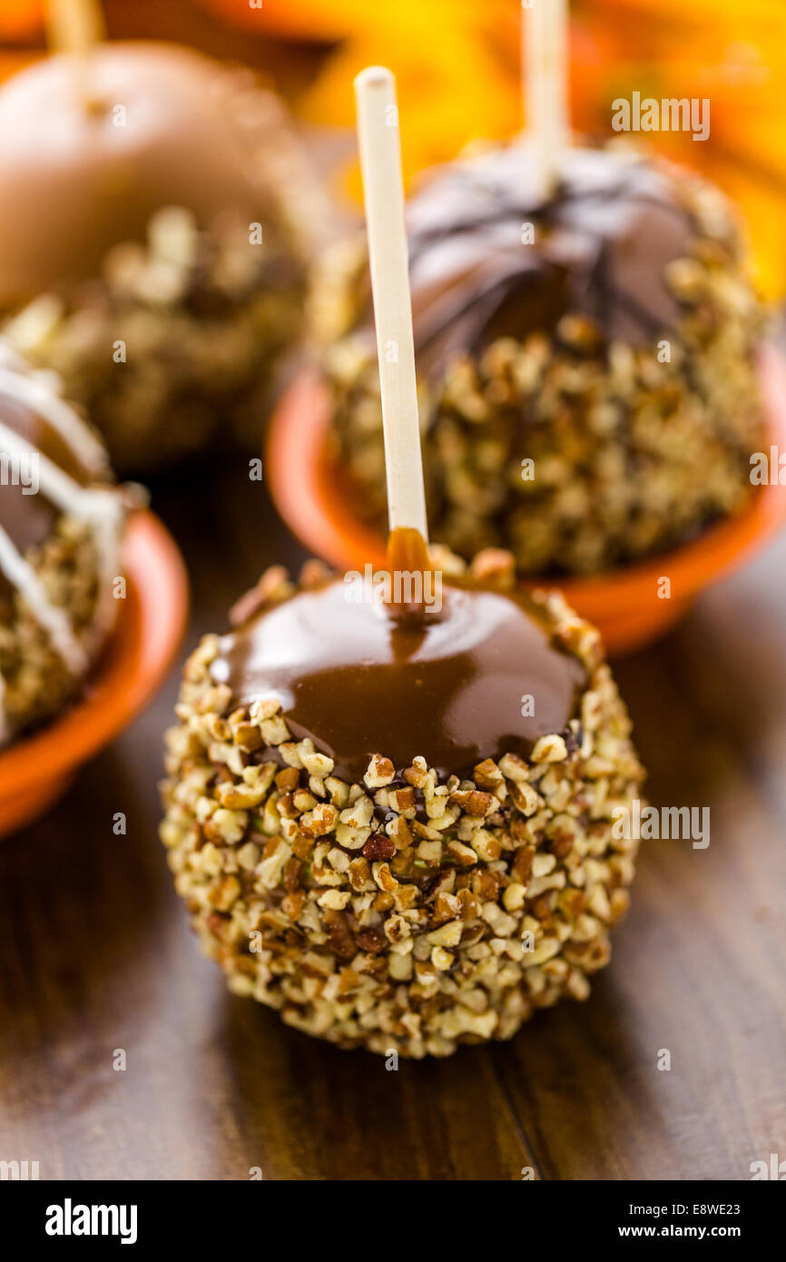 Hand dipped caramel apples decorated for Halloween Stock Photo - Alamy
