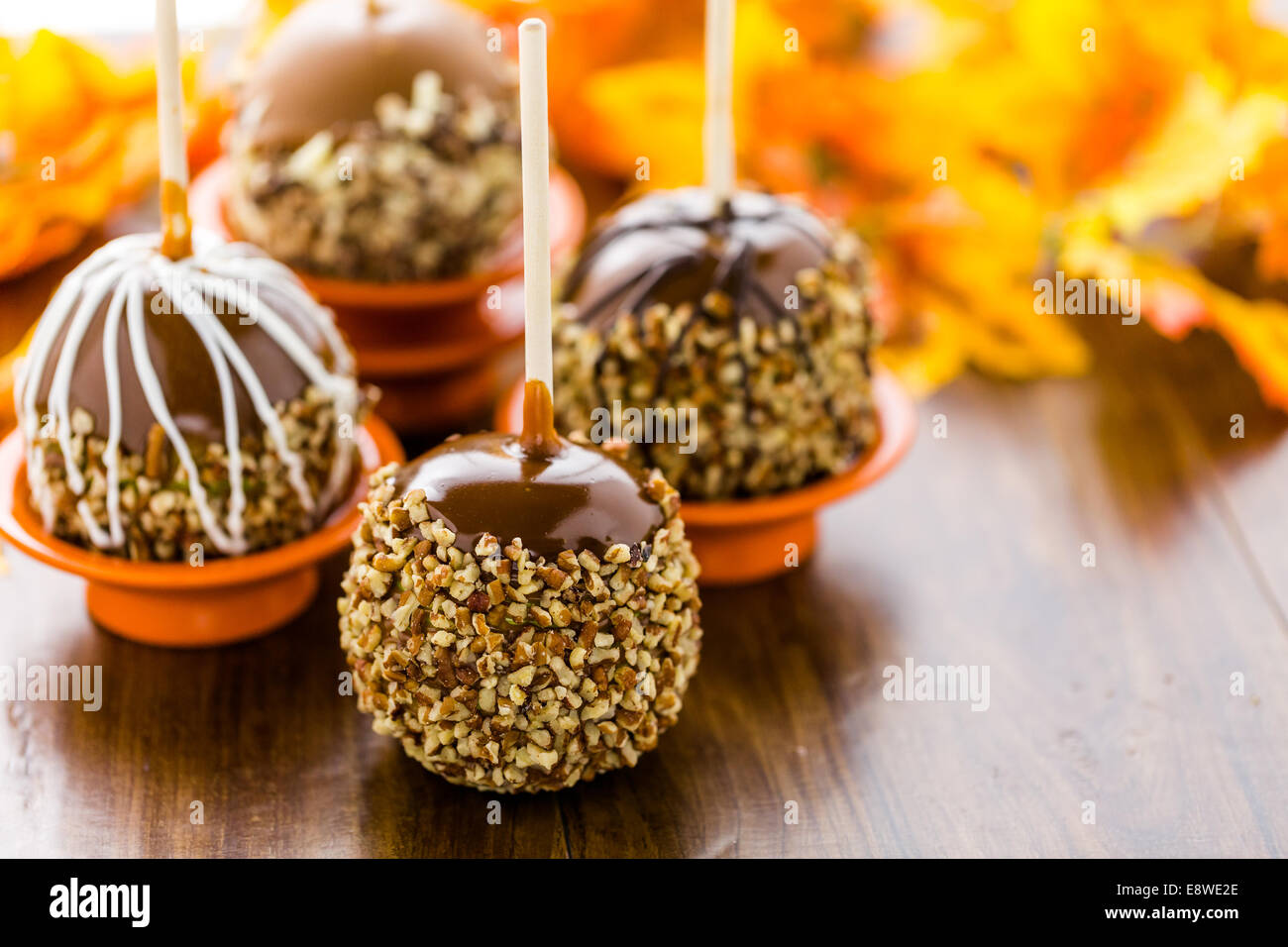 Hand dipped caramel apples decorated for Halloween Stock Photo - Alamy