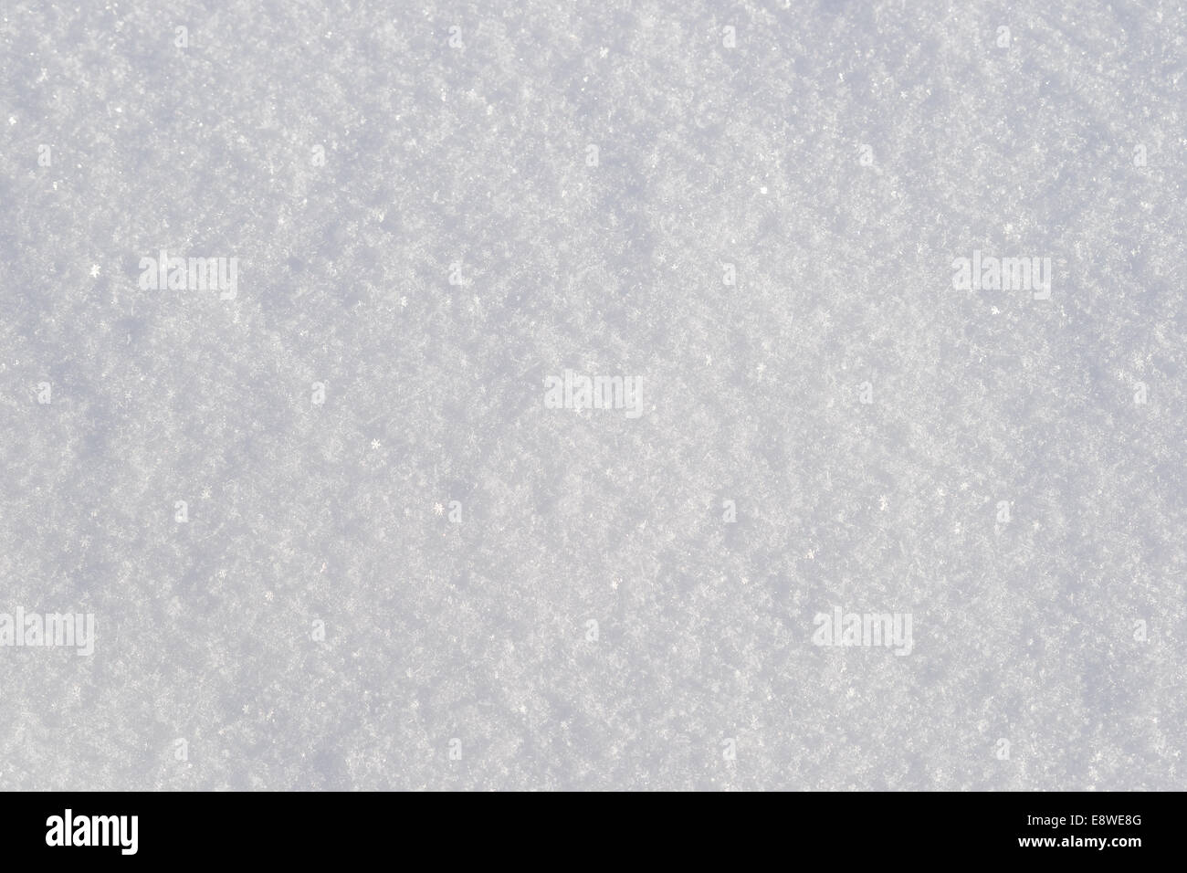 Texture of fresh snow with some snow flakes visible Stock Photo - Alamy