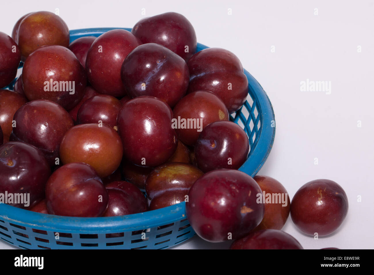 red fruit in basket Stock Photo - Alamy