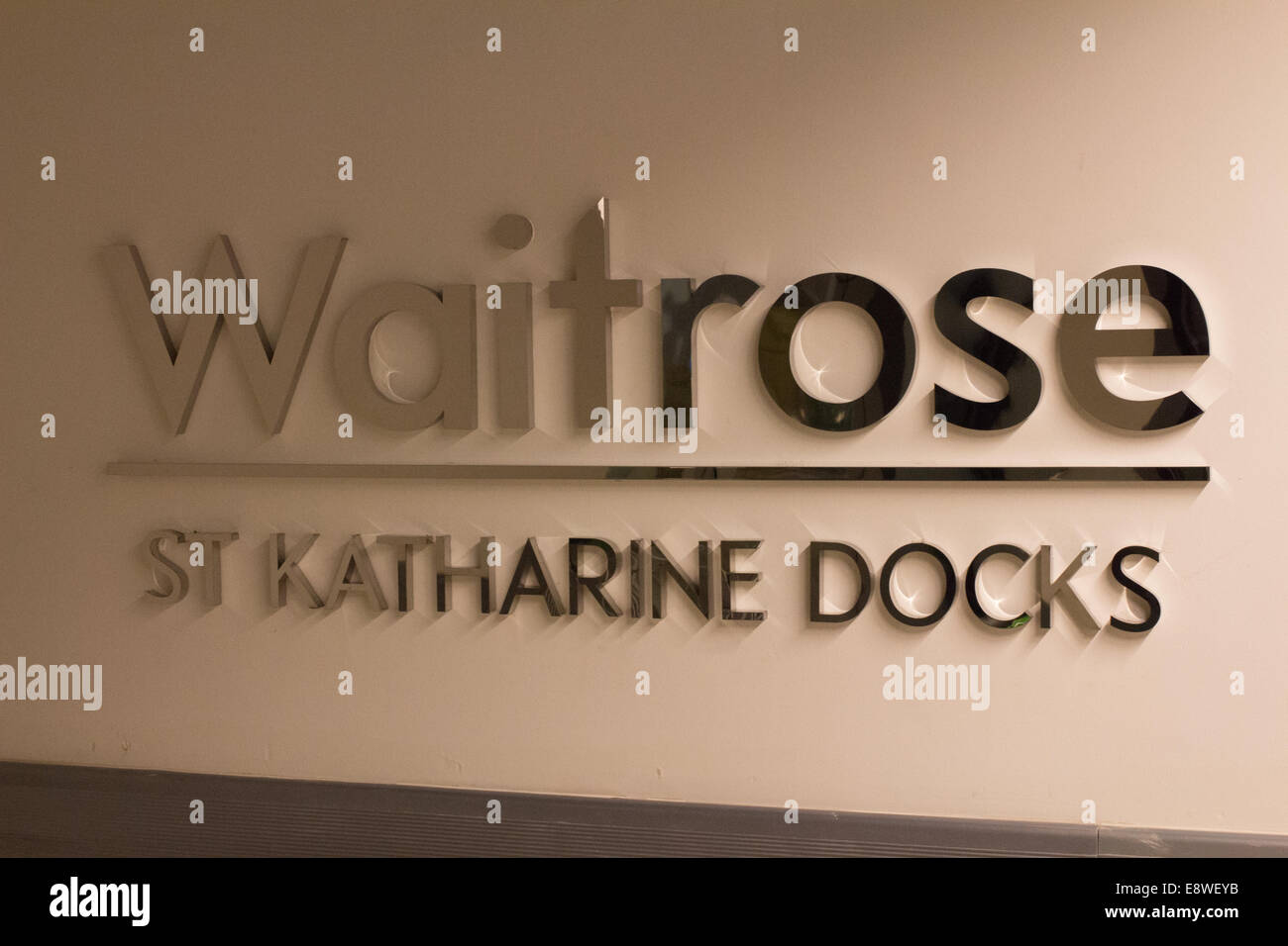 Waitrose sign at St Katharine Docks Stock Photo - Alamy