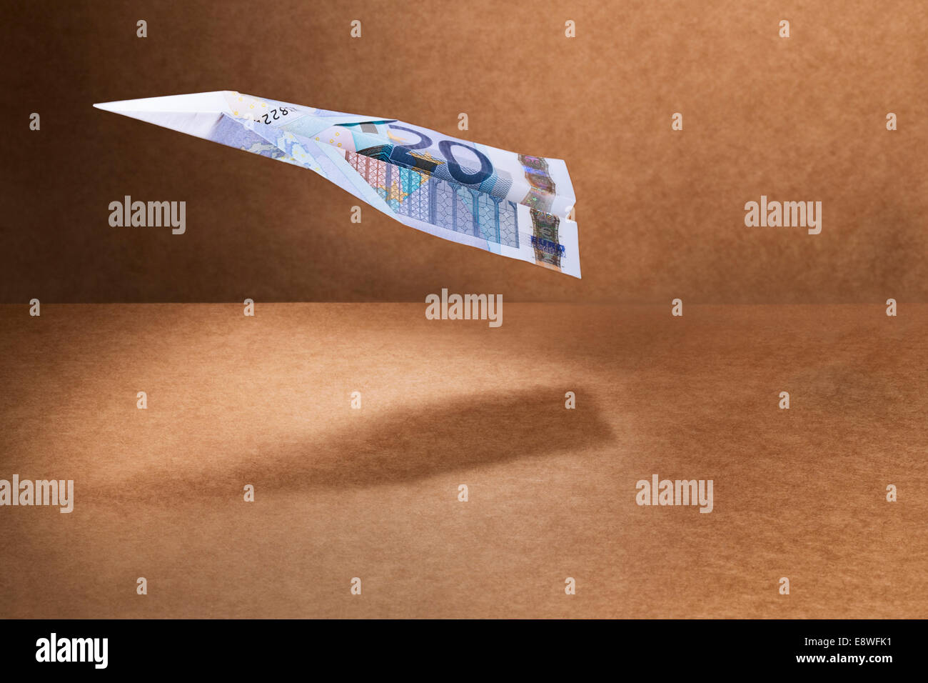 20 Euro note folded into paper airplane Stock Photo - Alamy
