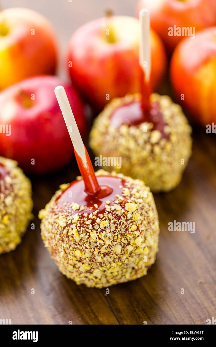 Hand dipped caramel apples decorated for Halloween Stock Photo - Alamy