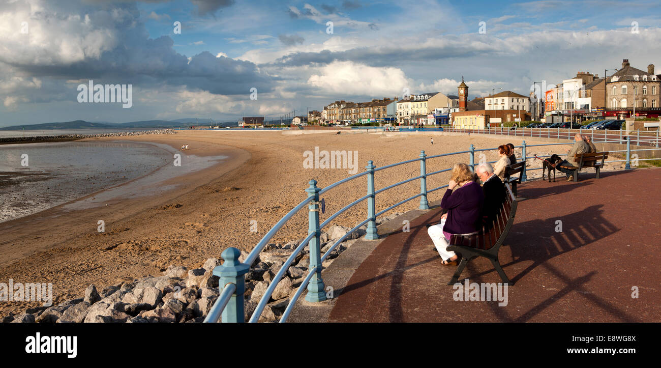 UK, England, Lancashire, Morecambe, visitors sat on promenade above ...