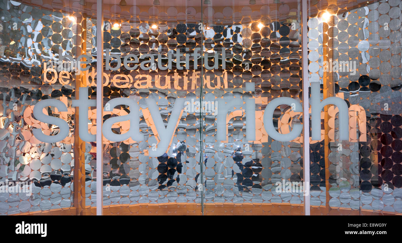 Stay Rich window sign in Liverpool City Centre, Merseyside, UK Stock ...