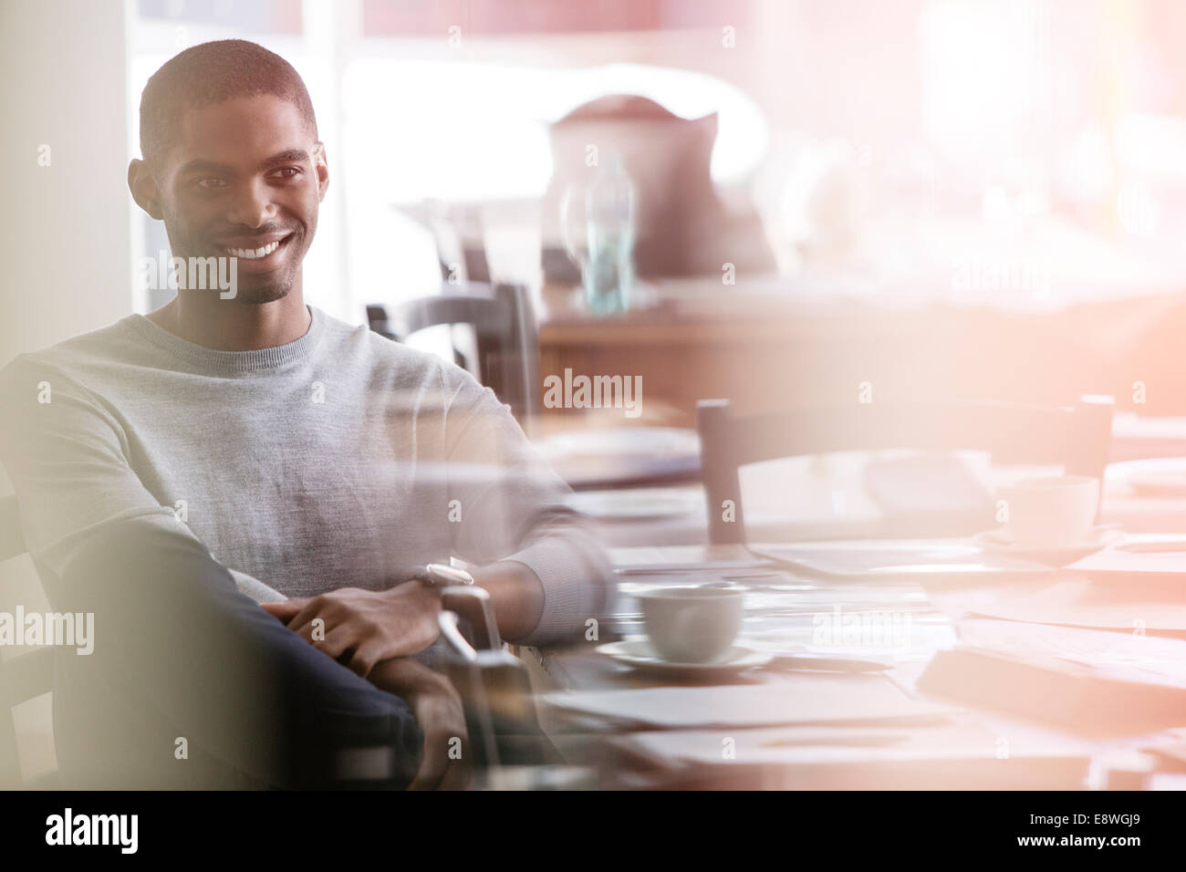 Man sitting in cafe Stock Photo - Alamy