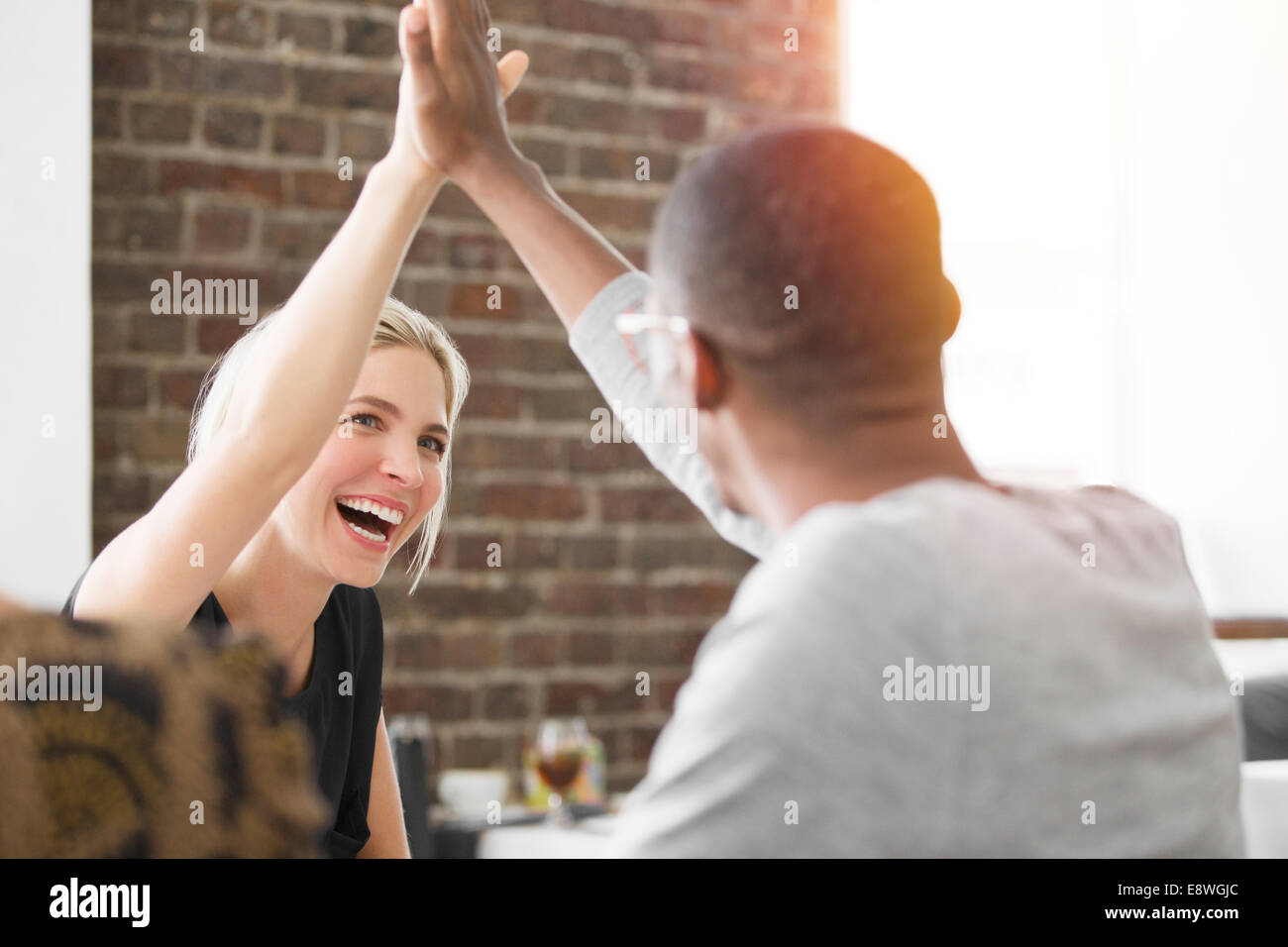 High Fiving High Resolution Stock Photography and Images - Alamy