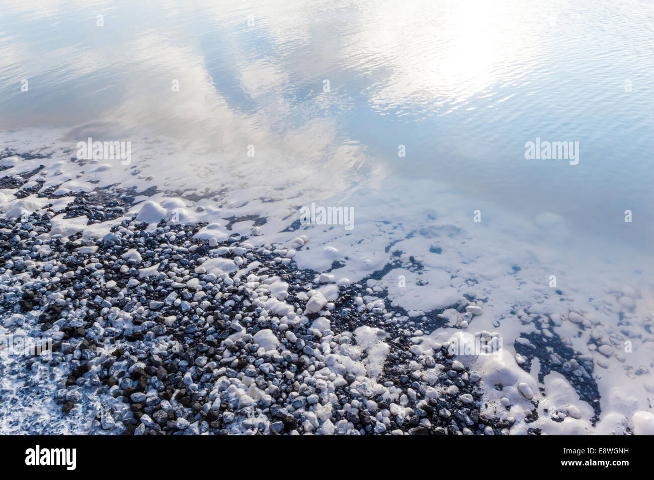 White limescale deposits against black lava rock at 'Blue Lagoon' in ...