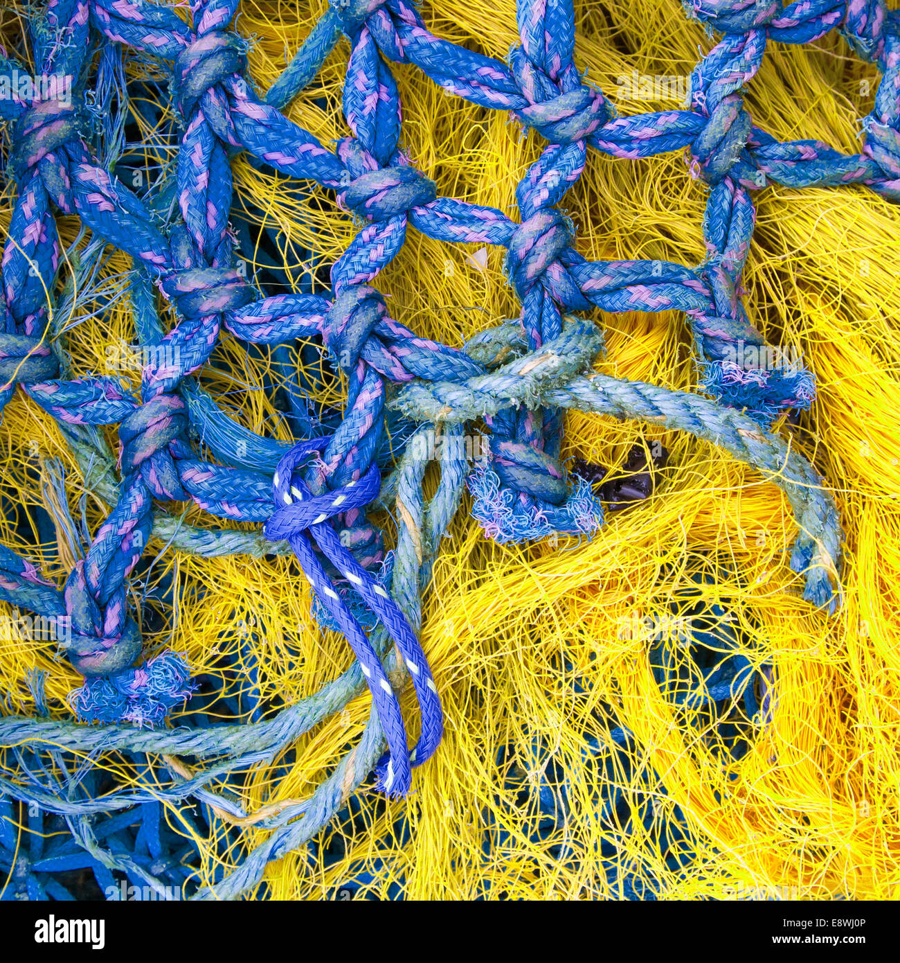 Abstract background with a pile of fishing nets ready to be cast ...