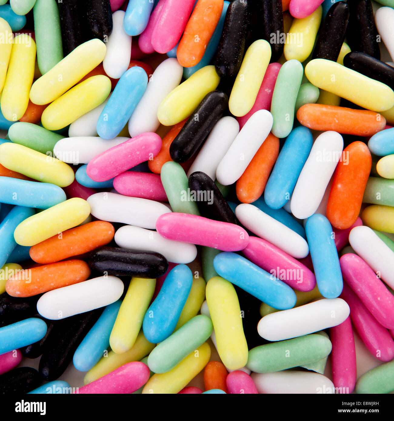 background of colorful laces rods candy in closeup Stock Photo - Alamy
