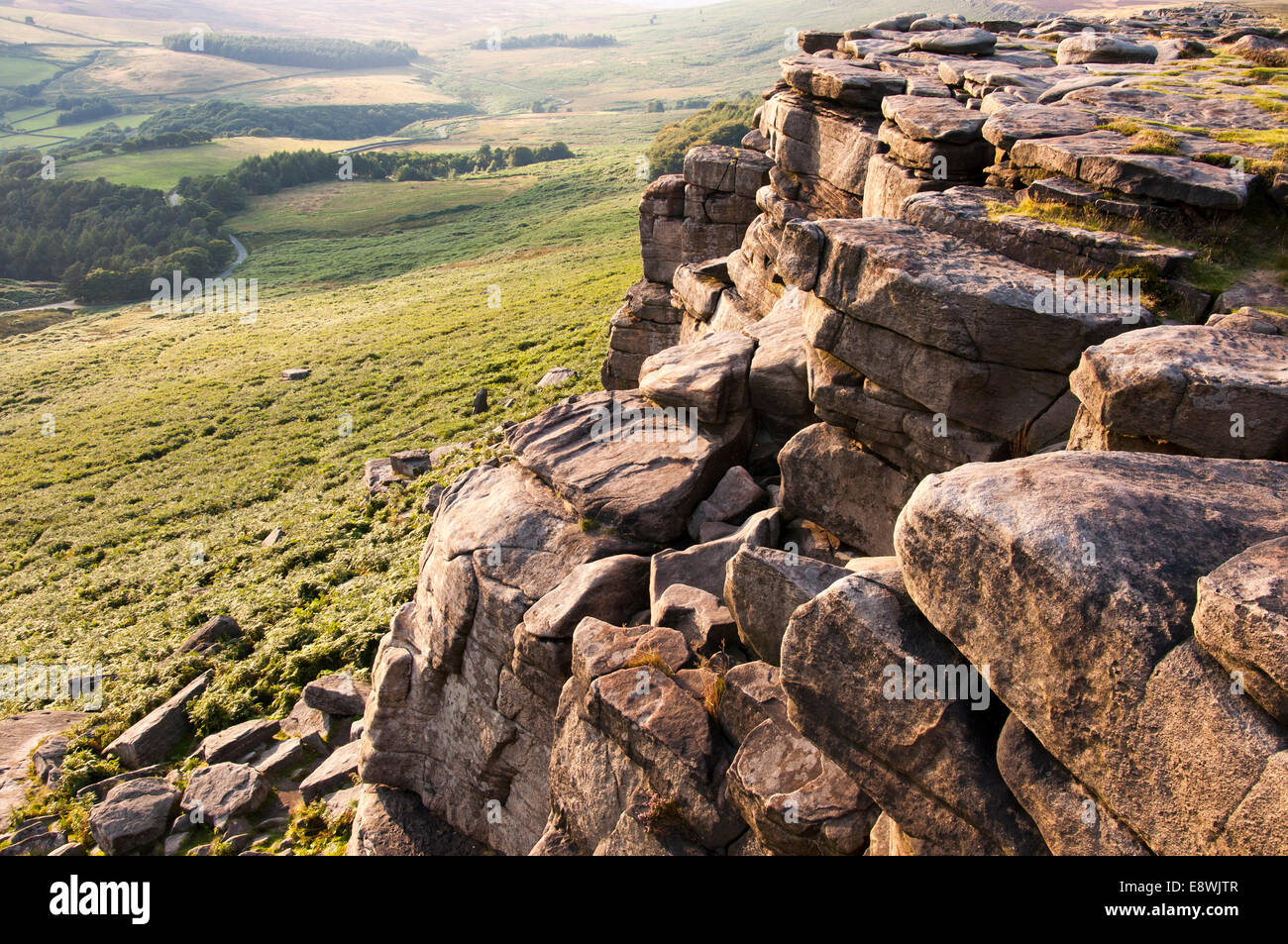 On the edge, Stanage Edge, Derbyshire. A rocky escarpment in the Peak ...