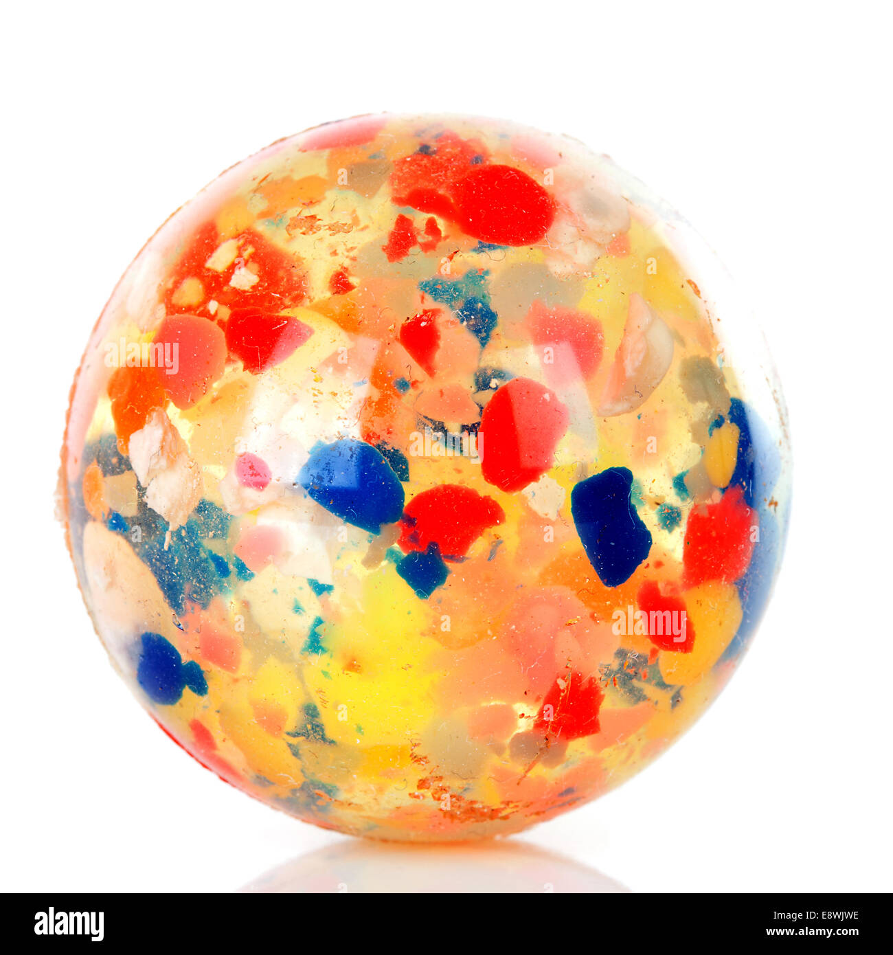 colorful bouncing ball in closeup over white background Stock Photo - Alamy