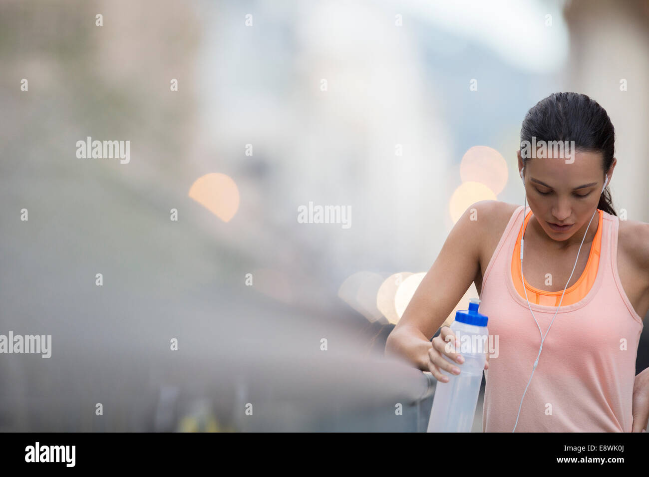 Woman resting after exercise Stock Photo - Alamy