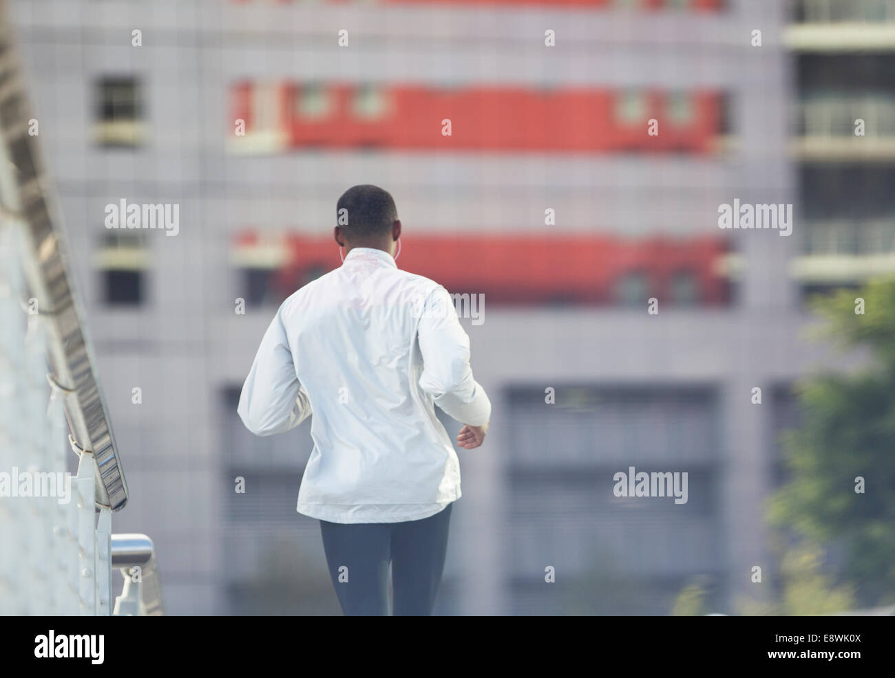 Man running street hi-res stock photography and images - Alamy
