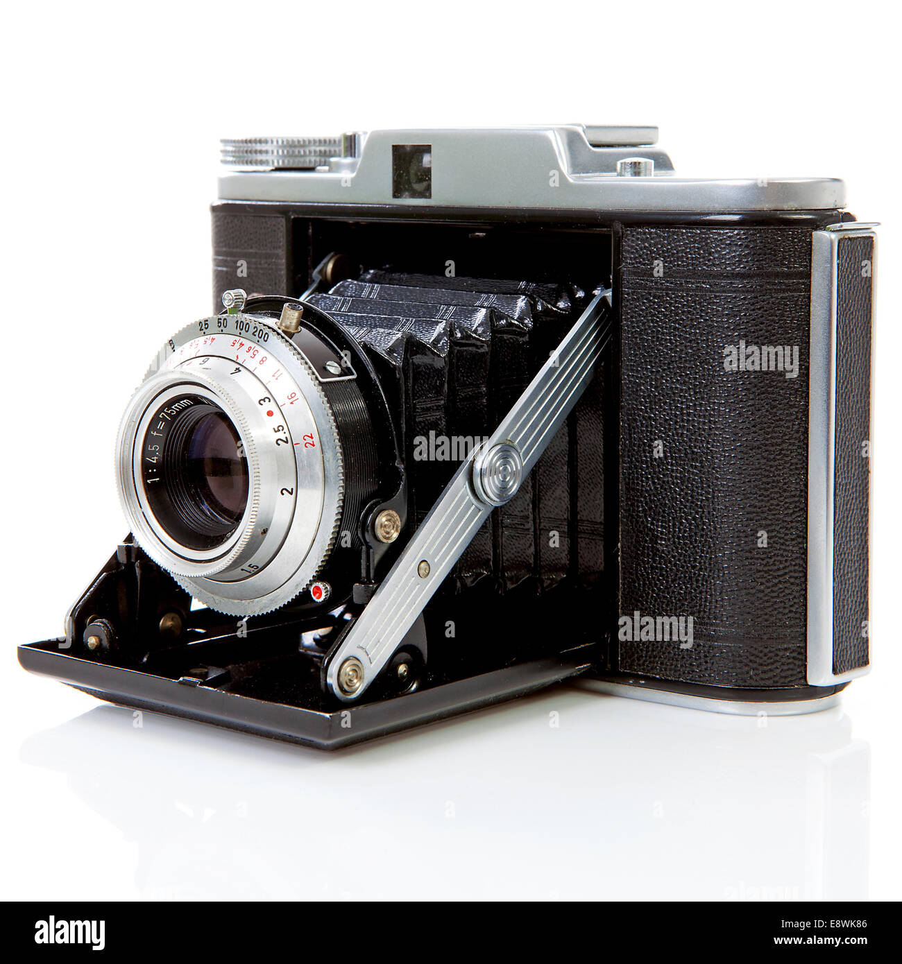 Old fashioned photo camera on white background Stock Photo - Alamy