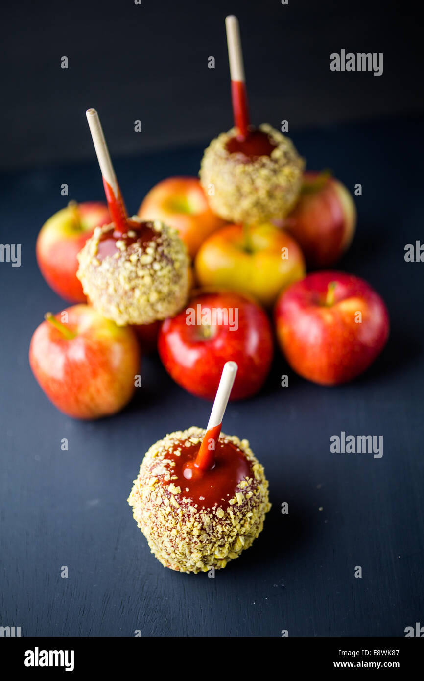 Hand dipped caramel apples decorated for Halloween Stock Photo - Alamy