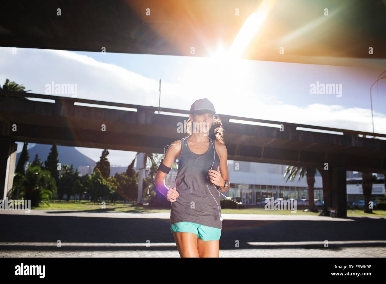 Woman running on road through hi-res stock photography and images - Alamy