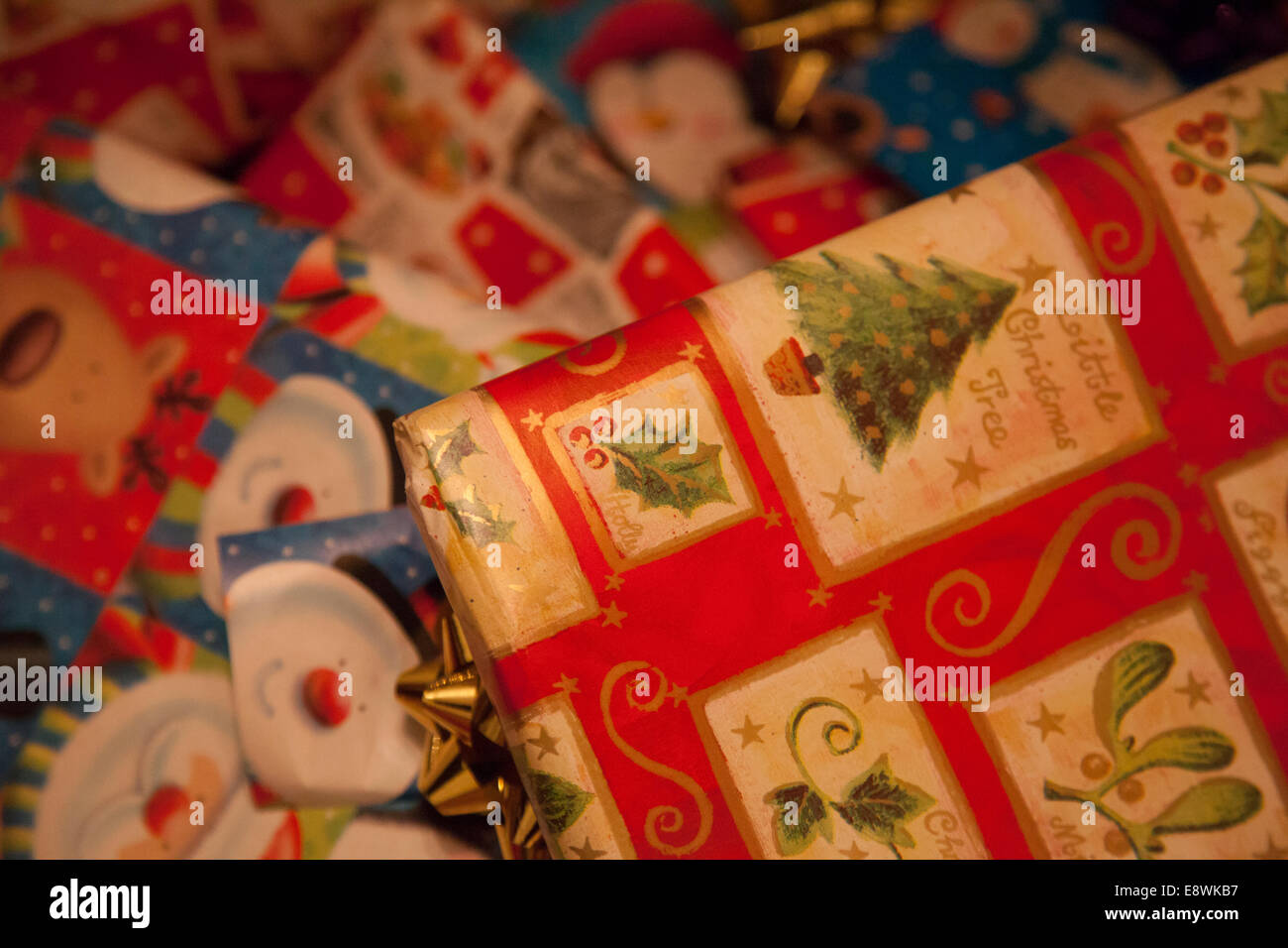 Christmas gifts wrapped and under the tree Stock Photo - Alamy