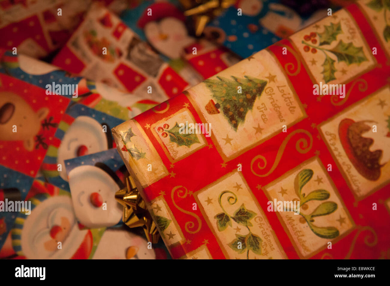 Christmas gifts wrapped and under the tree Stock Photo - Alamy