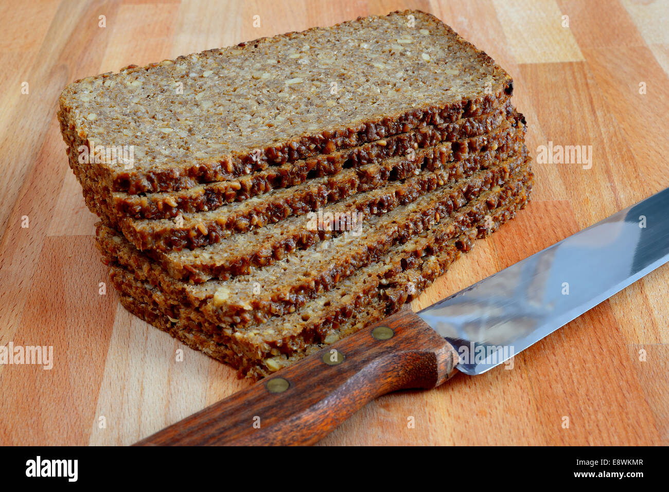 rye bread sliced on wooden table Stock Photo - Alamy