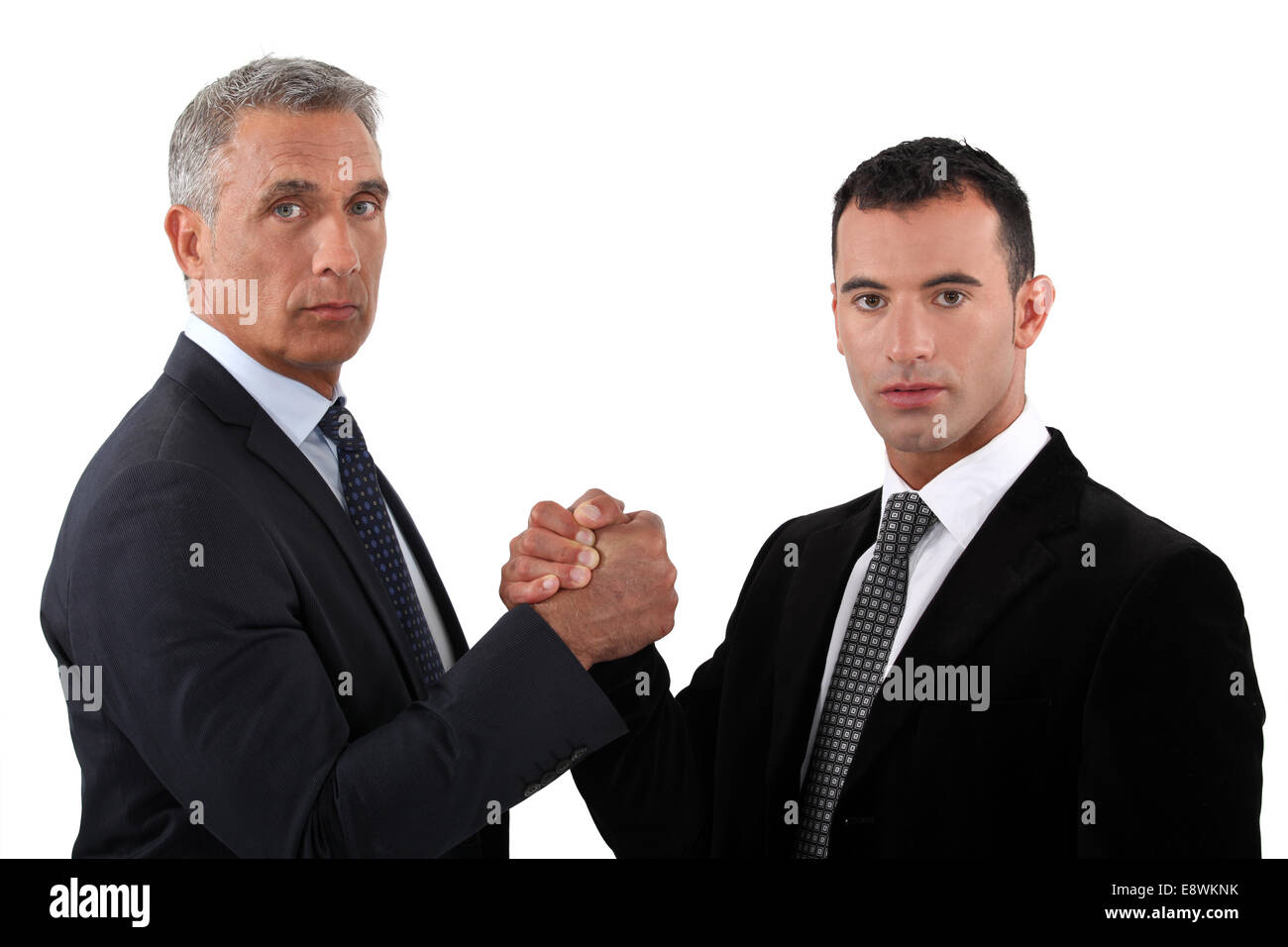 Businessmen forming a pact Stock Photo - Alamy