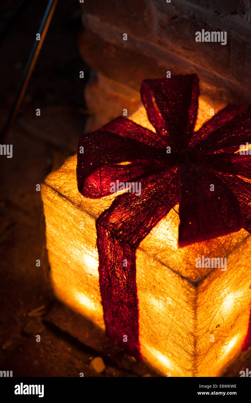 Festive gift wrapped Christmas lamp Stock Photo - Alamy