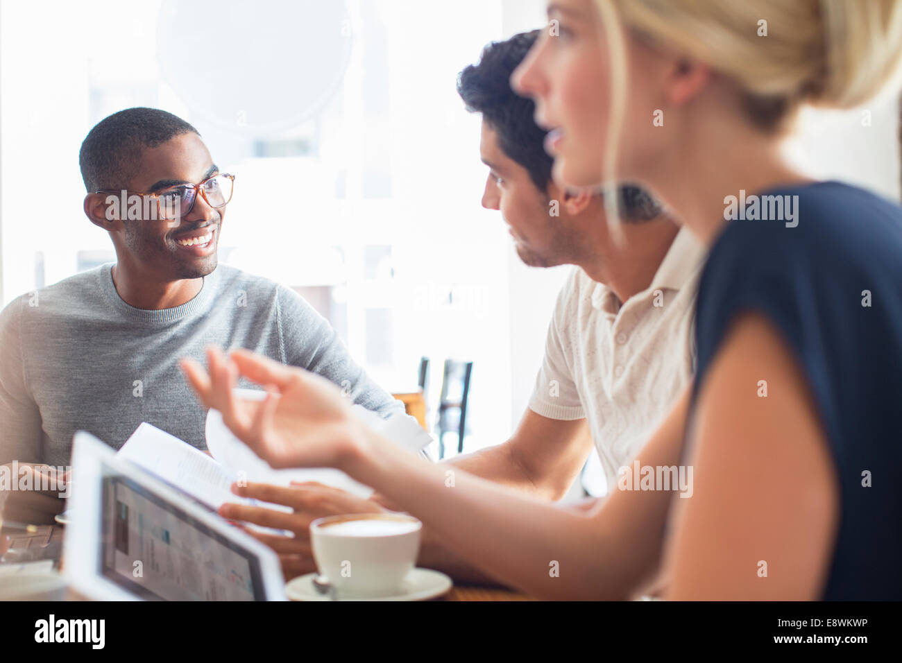 Business people sitting in cafe hi-res stock photography and images - Alamy