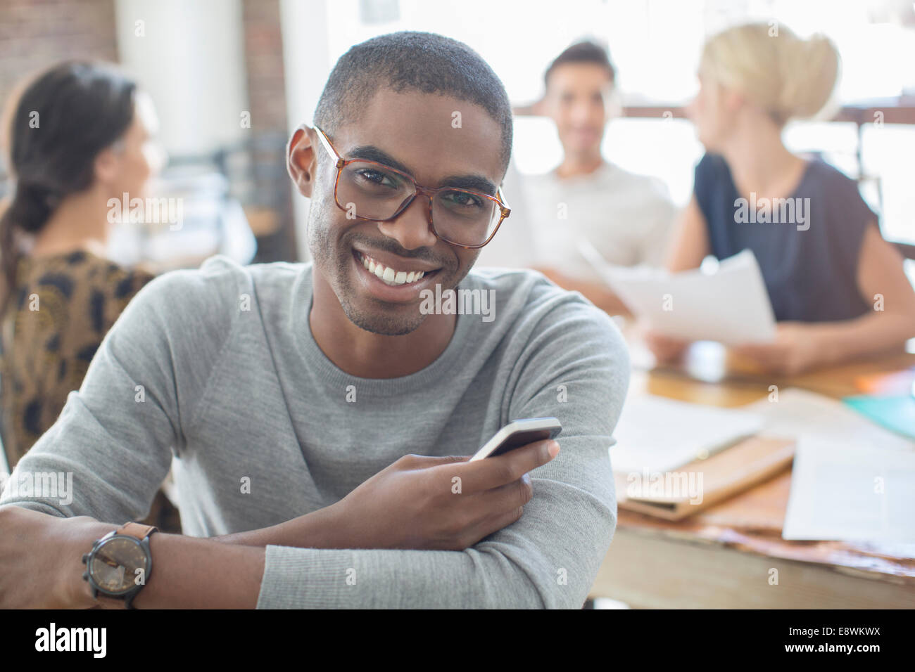 Use mobile phone in meeting hi-res stock photography and images - Alamy