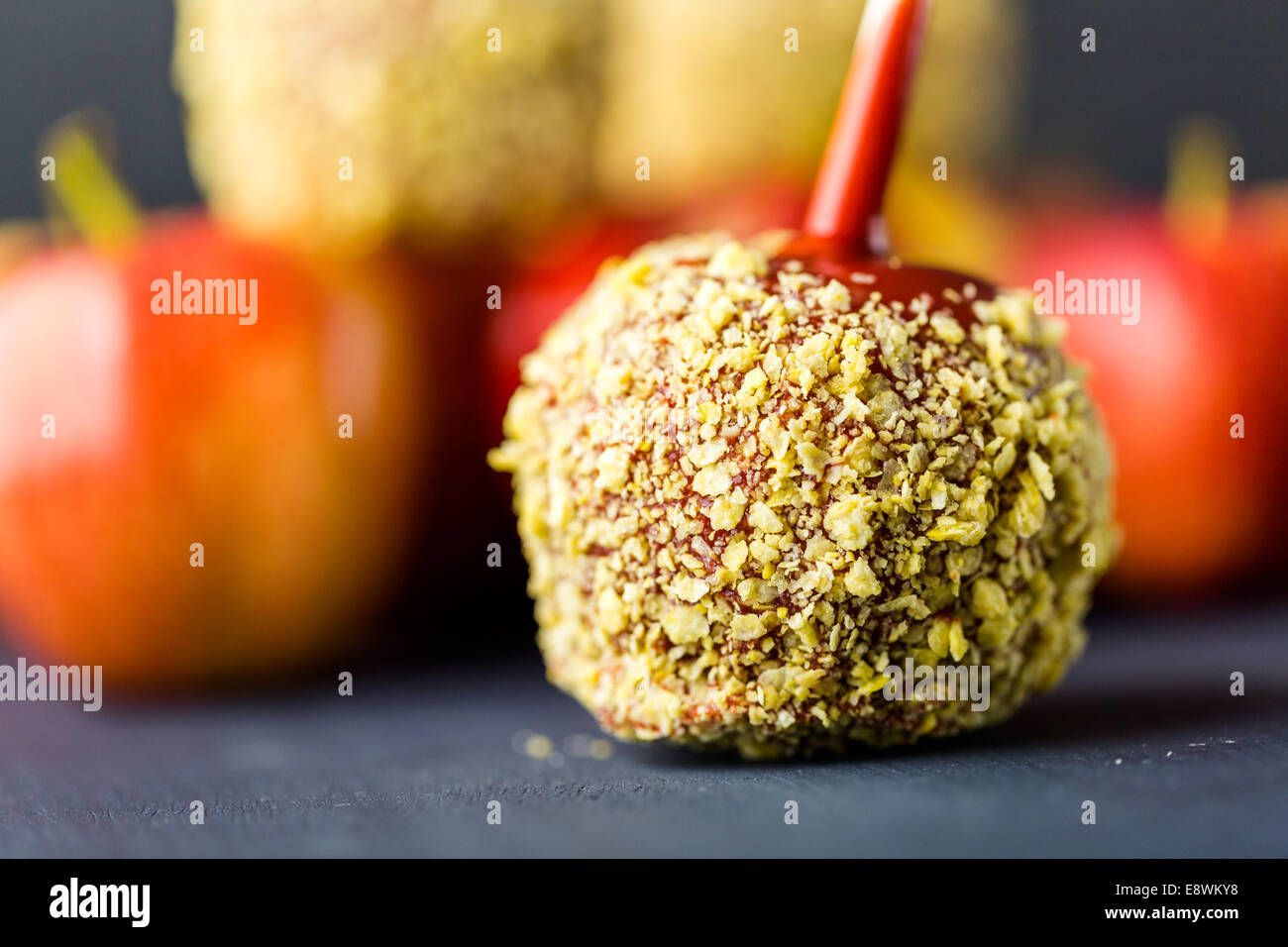 Hand dipped caramel apples decorated for Halloween Stock Photo - Alamy