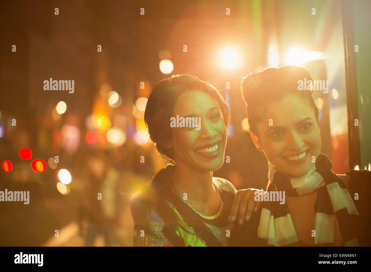 Women smile on street hi-res stock photography and images - Alamy