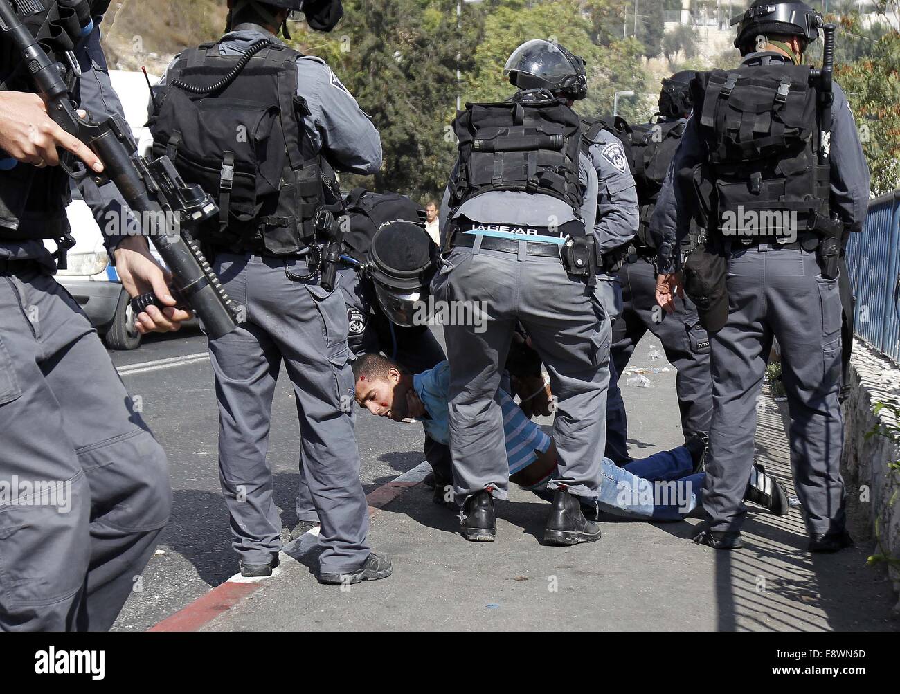 Muslim man arrested hi-res stock photography and images - Alamy
