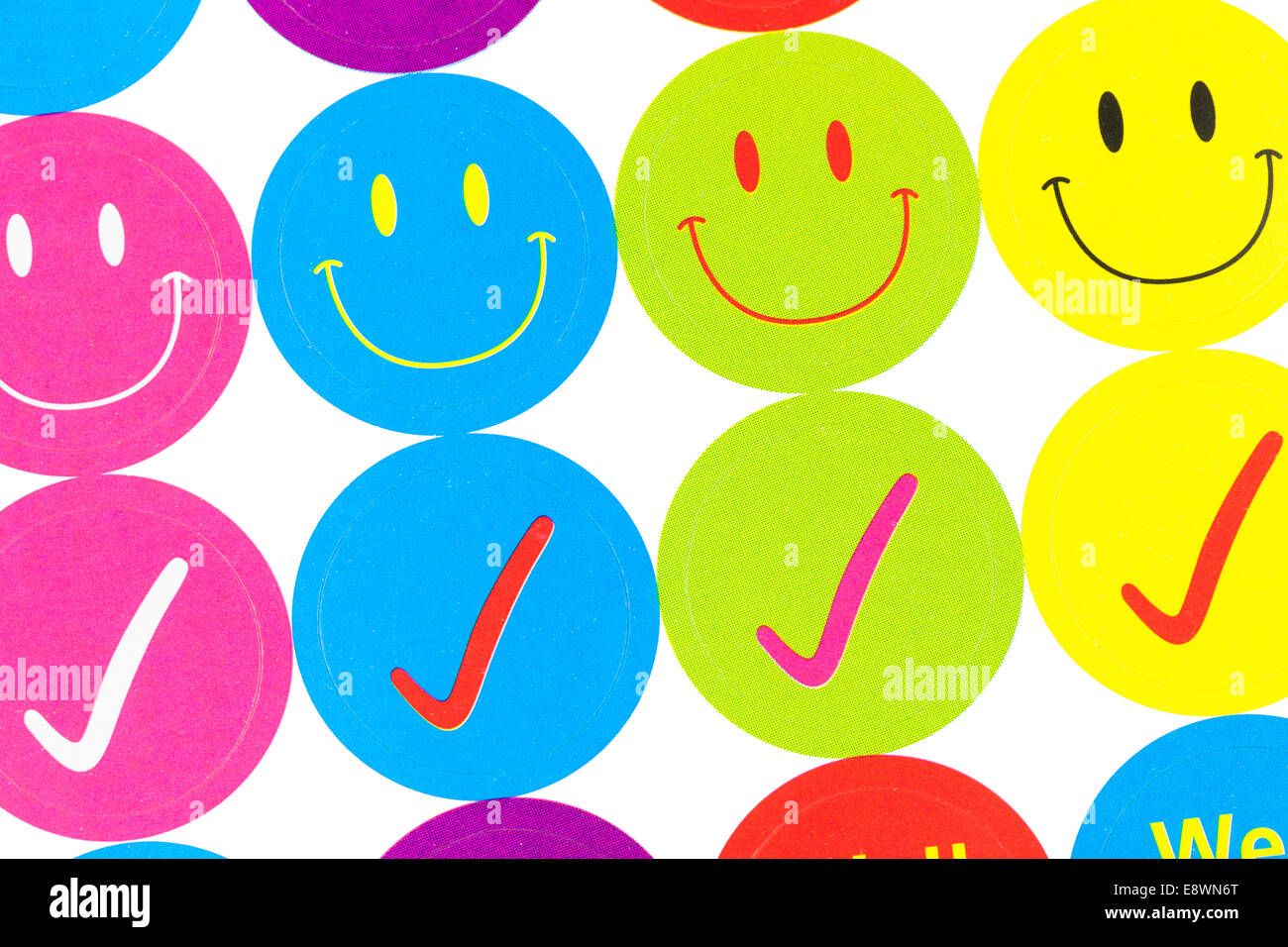 Tick off and smiley stickers Stock Photo - Alamy