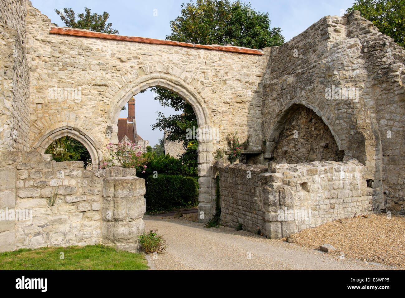 Ruined remains of old building with stone archway in College Avenue ...