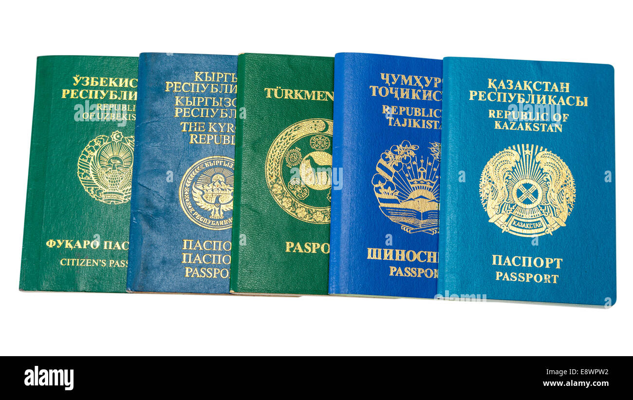 Different foreign passports on white background Stock Photo - Alamy