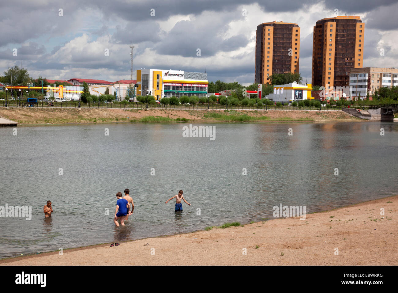 People beside the Ishim river in Astana, the capital of Kazakhstan ...