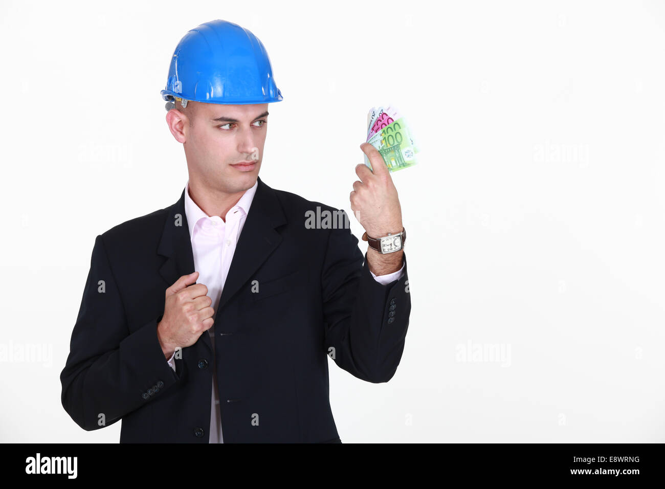 Foreman with bank notes Stock Photo - Alamy
