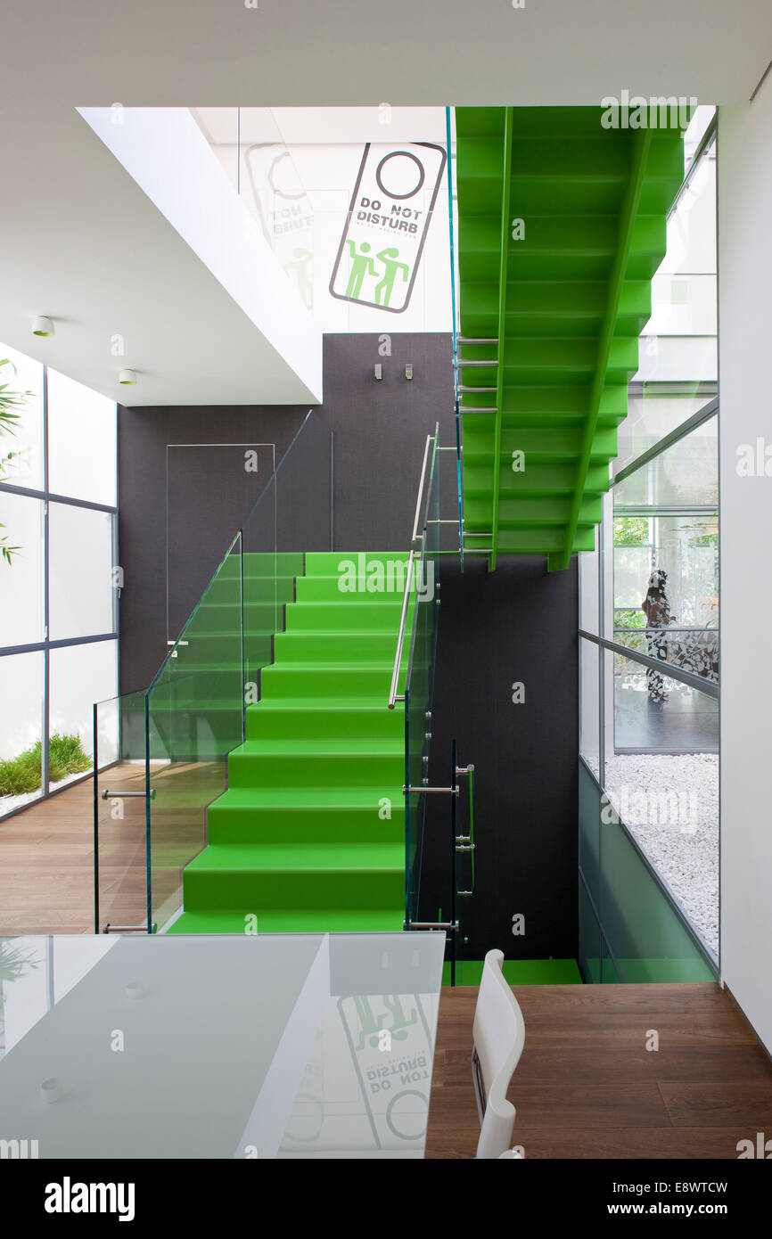 Bright green staircase in H House, Israel, Middle East Stock Photo - Alamy