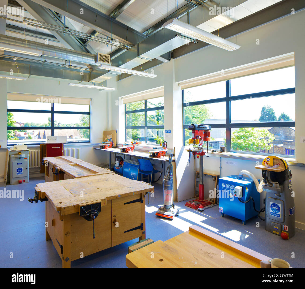 Woodwork benches with vices in classroom of Leyton Sixth Form College ...
