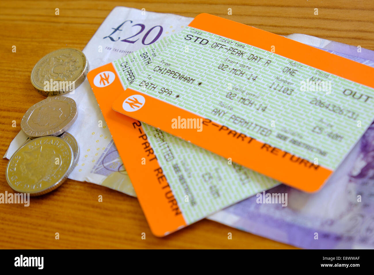 UK rail tickets and money photographed on a tabletop Stock Photo - Alamy