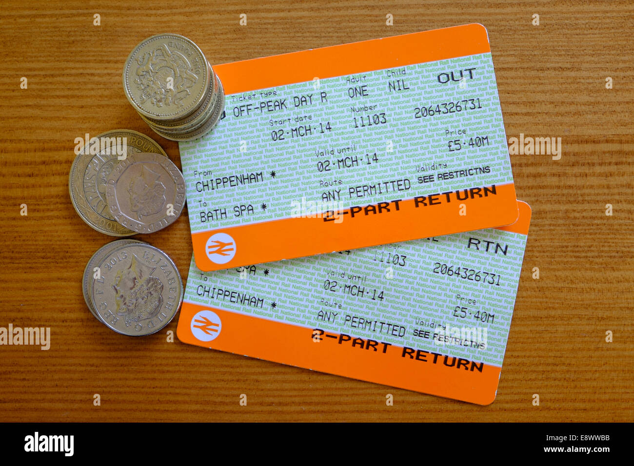 UK rail tickets and money photographed on a tabletop Stock Photo - Alamy