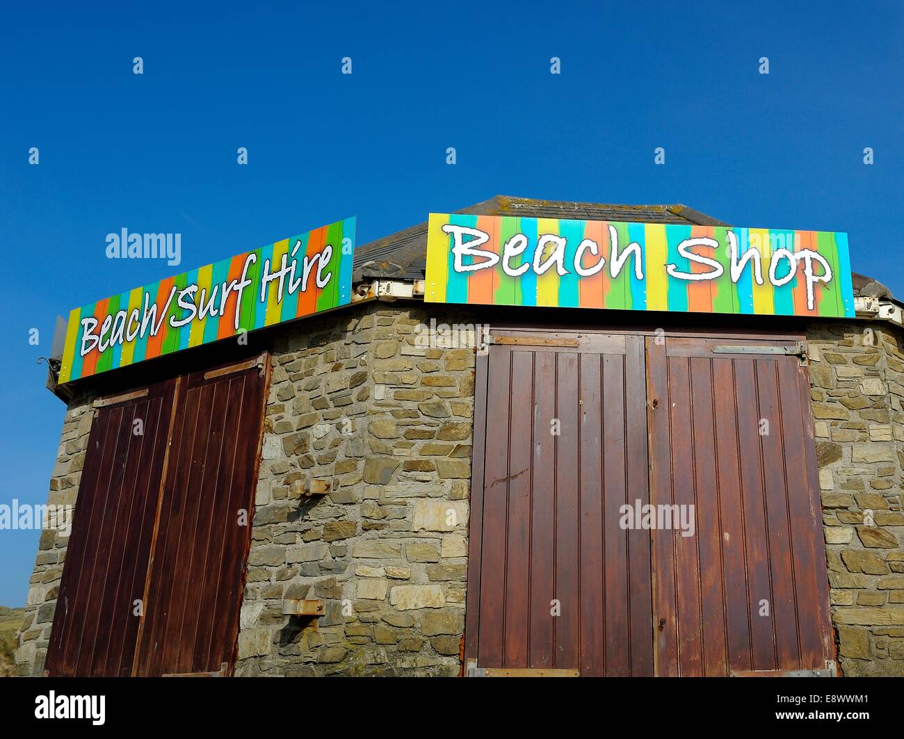 Colorful beach shop surf hire sign Perranporth Cornwall England uk ...