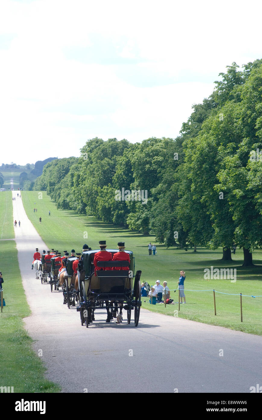 Royal Carriage driving down the Long Walk behind Windsor Castle ...