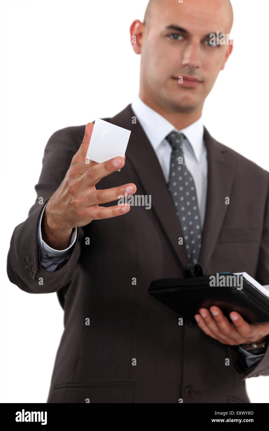 Man offering business card Stock Photo - Alamy