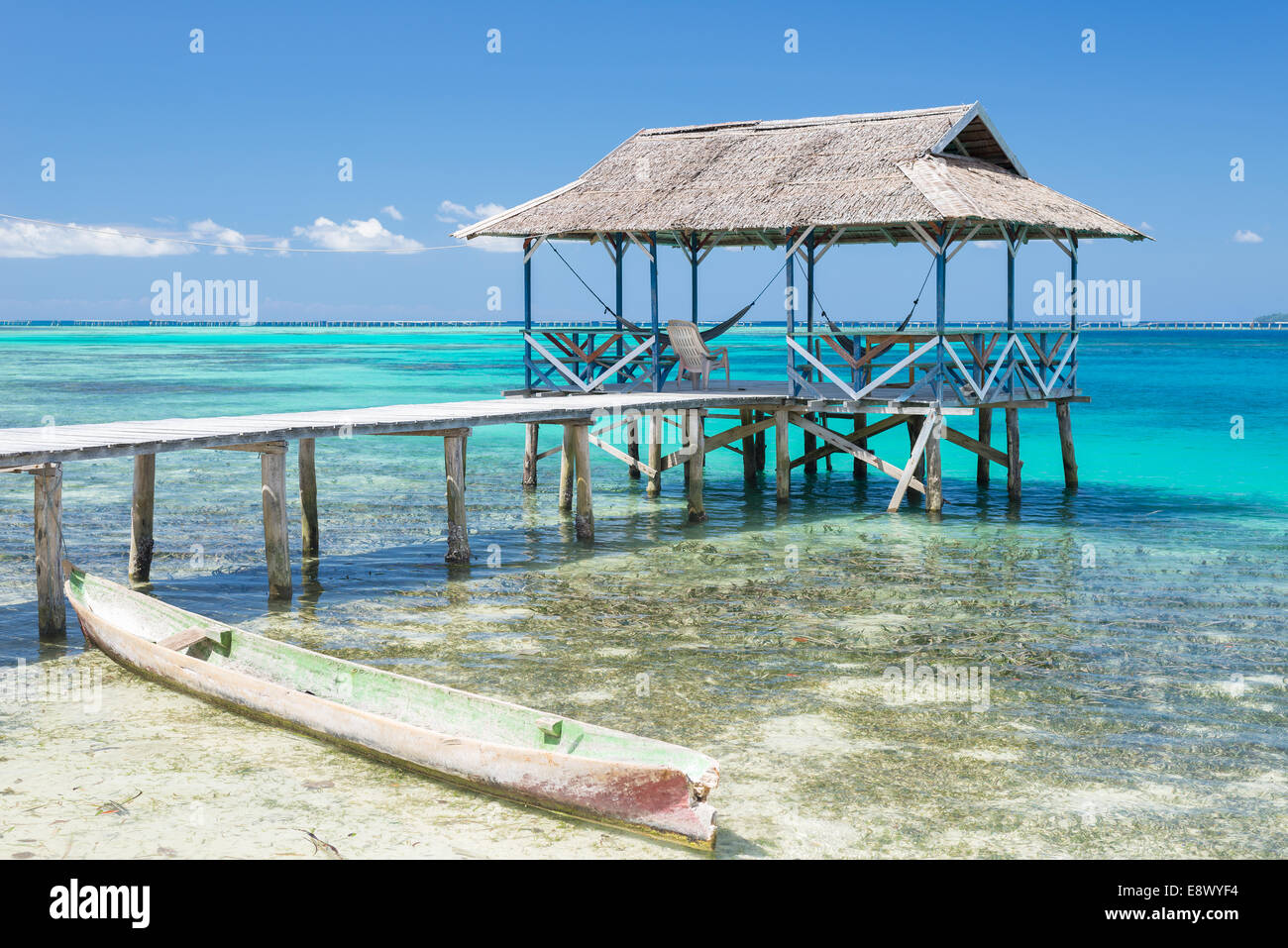 Wooden jetty in a tourist resort of the remote Togean Islands, Central ...