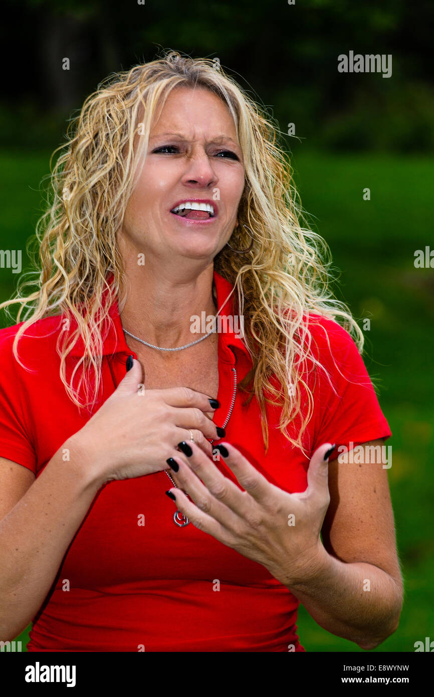 Female model in casual clothing laughing Stock Photo - Alamy