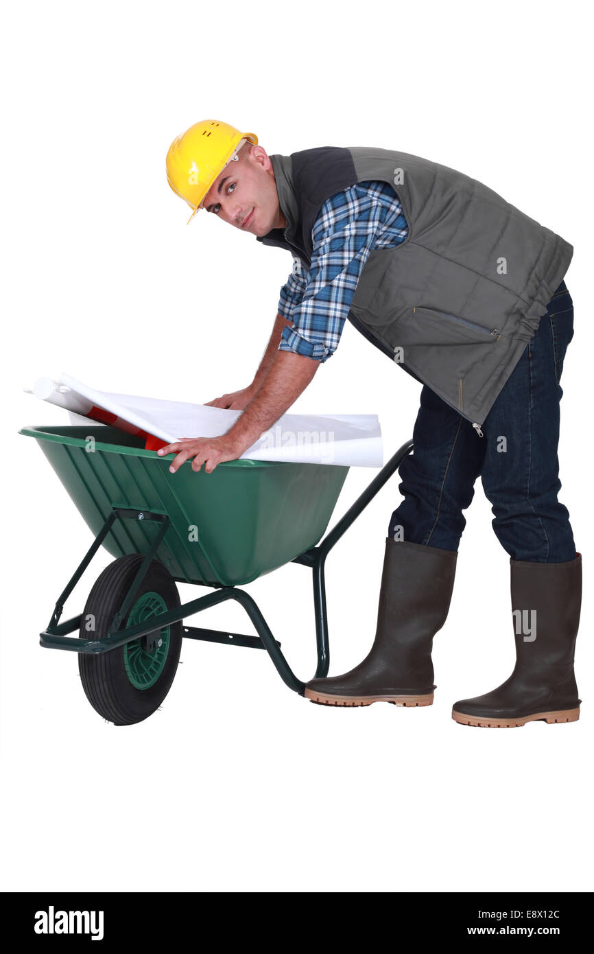 Bricklayer on trolley Stock Photo - Alamy