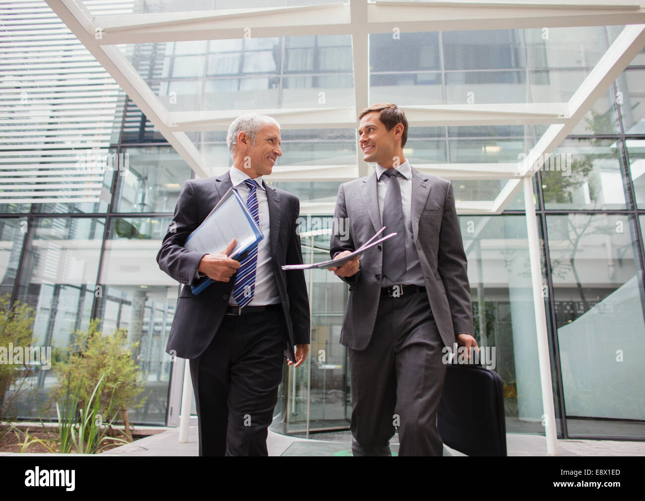 Office worker walking outdoors hi-res stock photography and images - Alamy